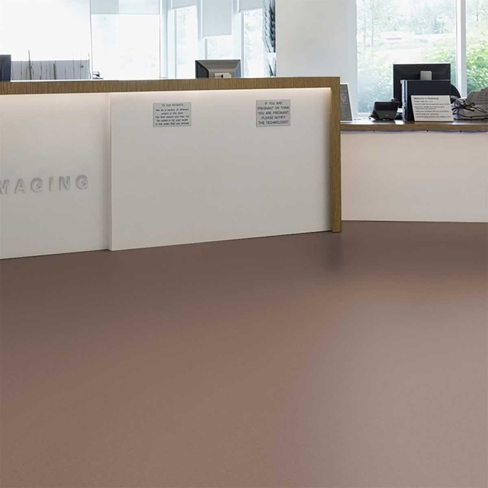 Sol PVC Tarkett marron clair- locaux collectifs
