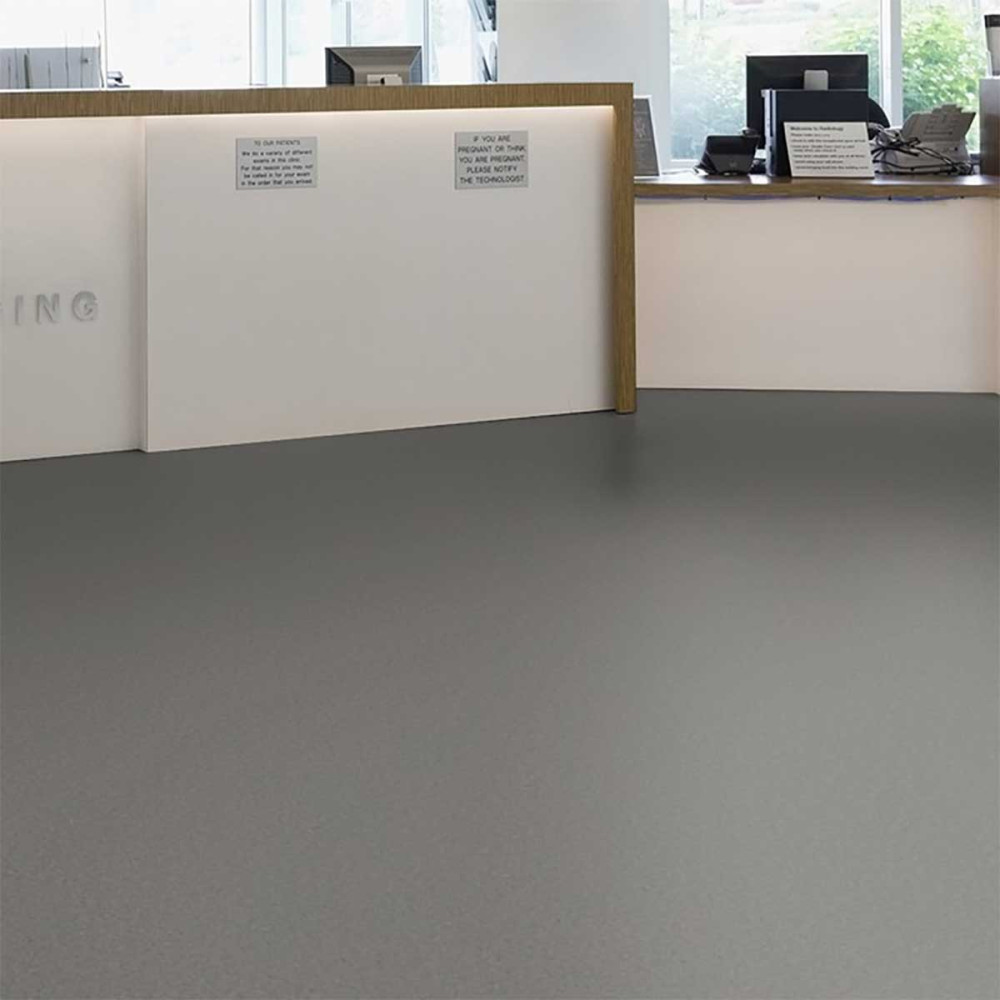 Sol PVC Tarkett gris beton en rouleau